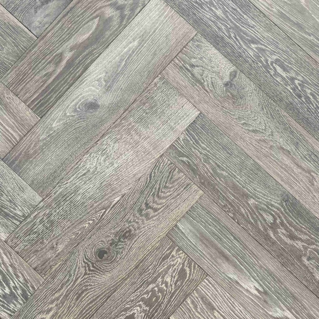 New Deluxe Laminate Herringbone Smoked Colour 12x101x606mm